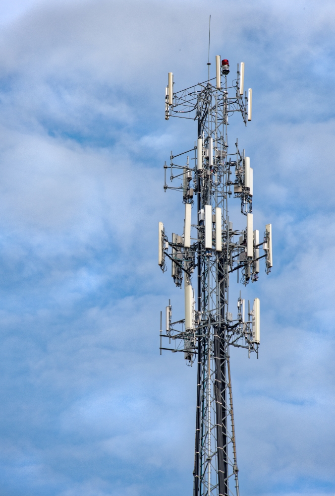 cell tower with white puffy clouds in the background photo 85025 ...