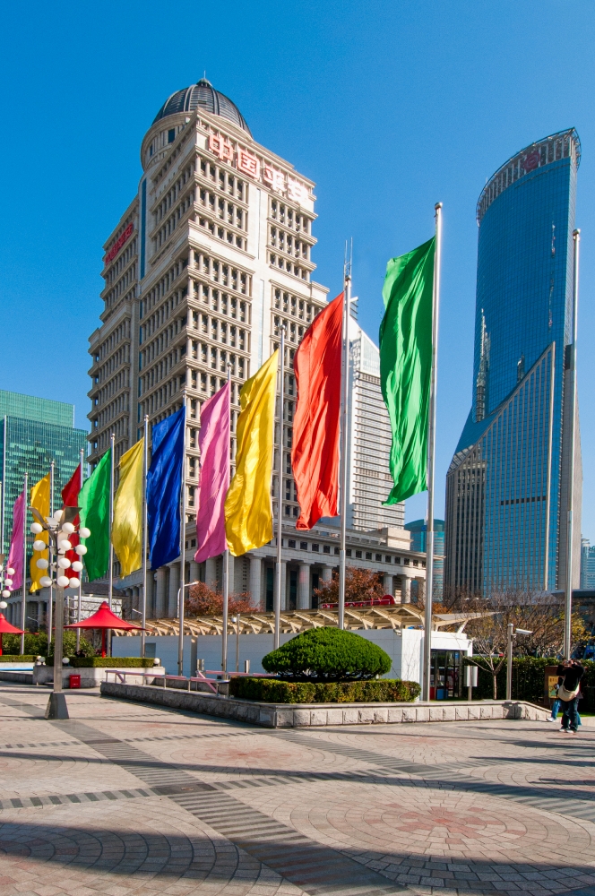 colorful flags outside building in shanghai china - Classroom Clip Art
