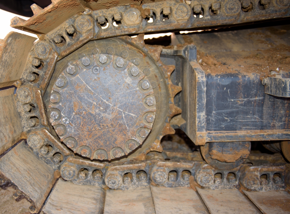 Excavator Heavy construction equipment closeup side view tracks ...