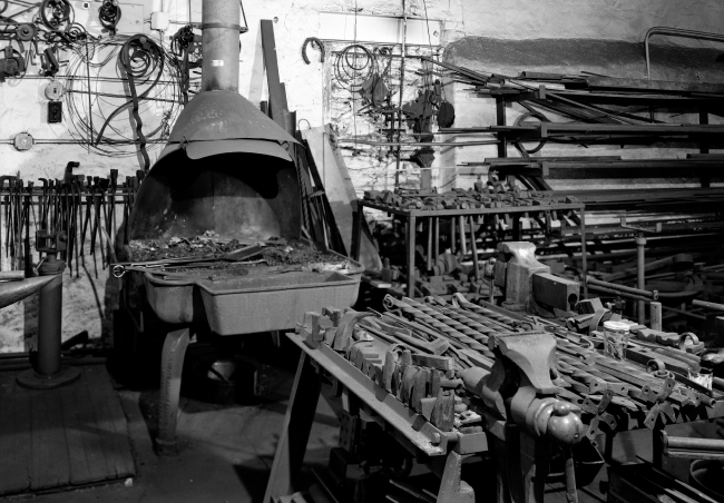 Forge area showing tools iron works historical photo - Classroom Clipart