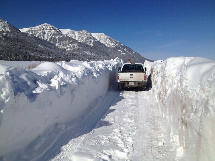 high snow banks on snow covered roadway - Classroom Clip Art