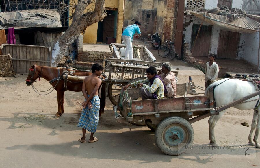 people in wooden carts on dirt street india - Classroom Clip Art
