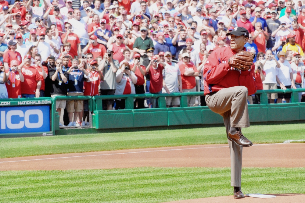 President Barack Obama throws out the ceremonial first pitch ...