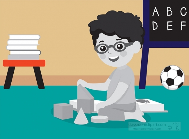 cute boy playing with blocks in kindergarten gray color - Classroom ...
