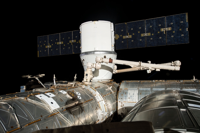 the spacex dragon cargo craft is installed to the harmony module ...