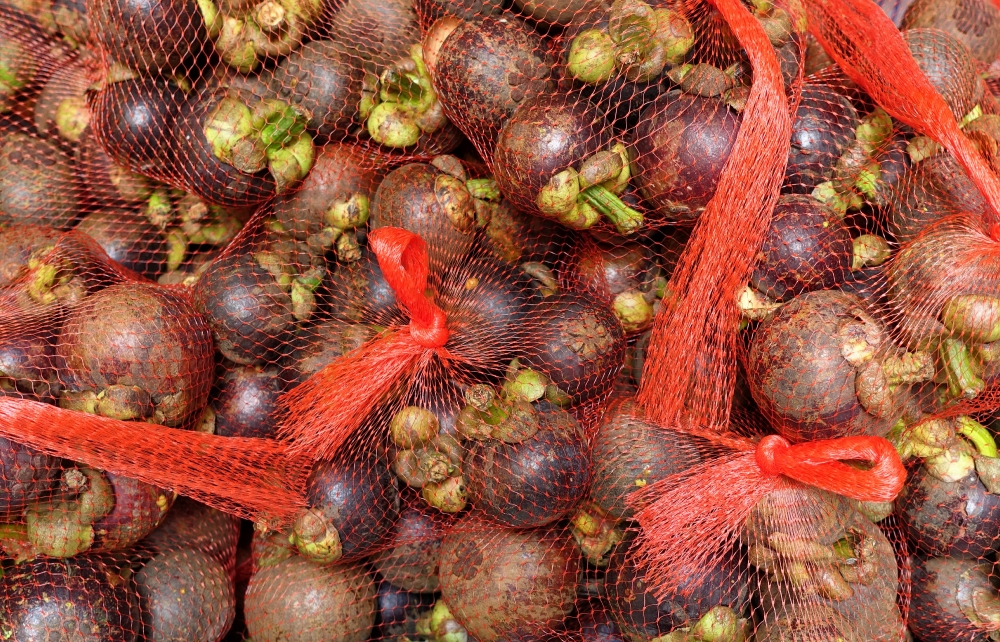 tropical mangoteen fruit at market - Classroom Clip Art